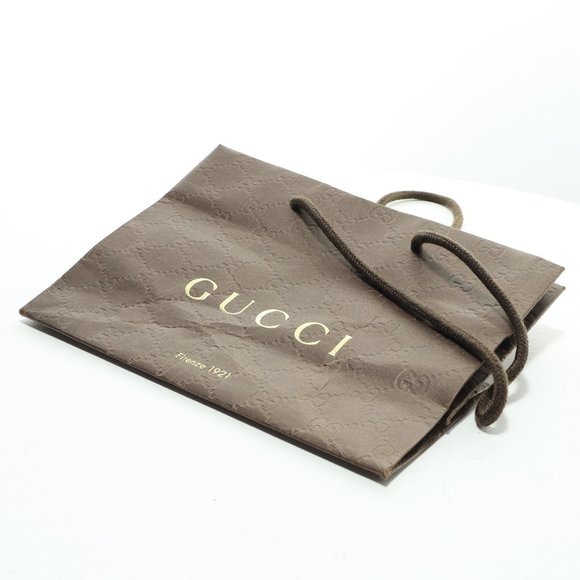 Gucci | Bags | Gucci Small Embossed Paper Gold Print Product Bag ...